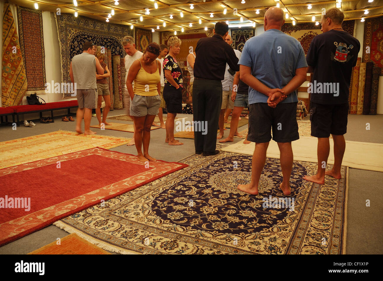 tourists visiting turkish carpet factory dalaman turkey Stock Photo - Alamy