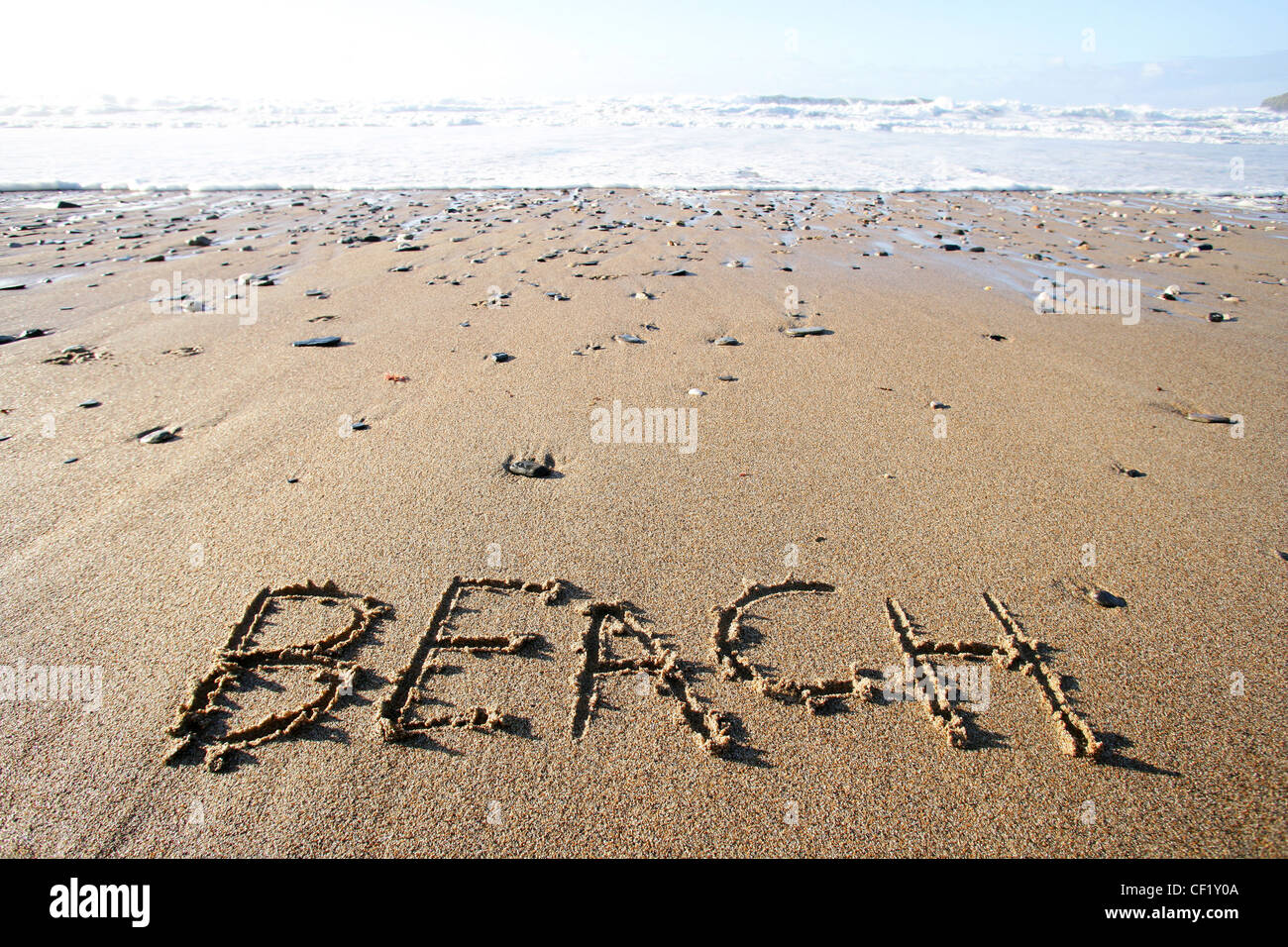 Writing in the sand at Praa Sands. A huge sandy beach popular with ...