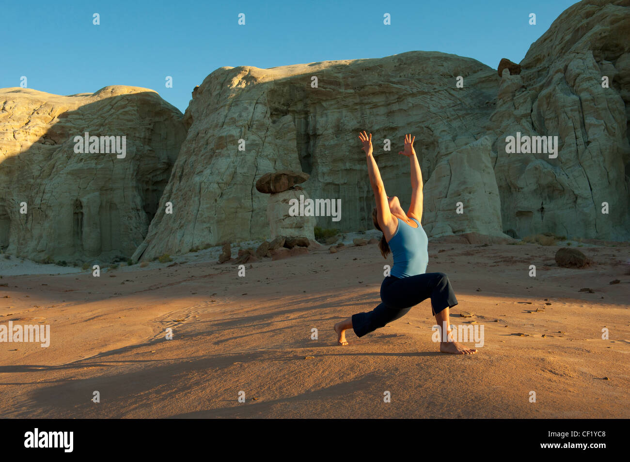 Woman yoga exercise in desert hi-res stock photography and images - Alamy