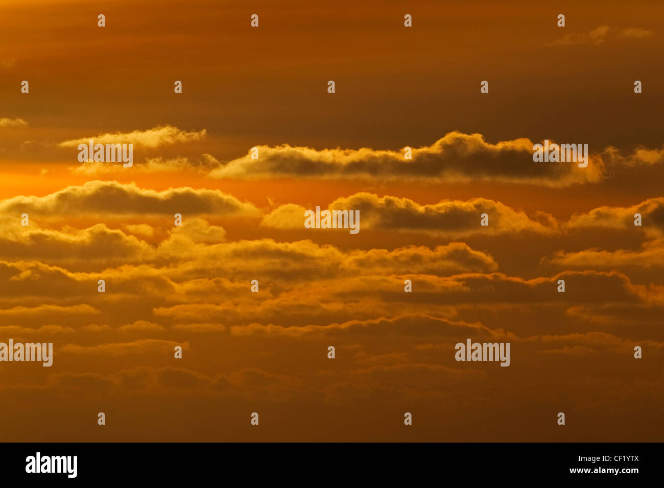 Orange sunset with clouds Stock Photo - Alamy