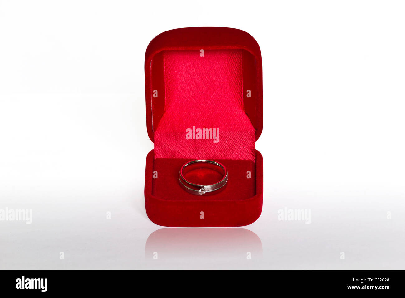 Ring in open red velvet box isolated on white background Stock Photo ...
