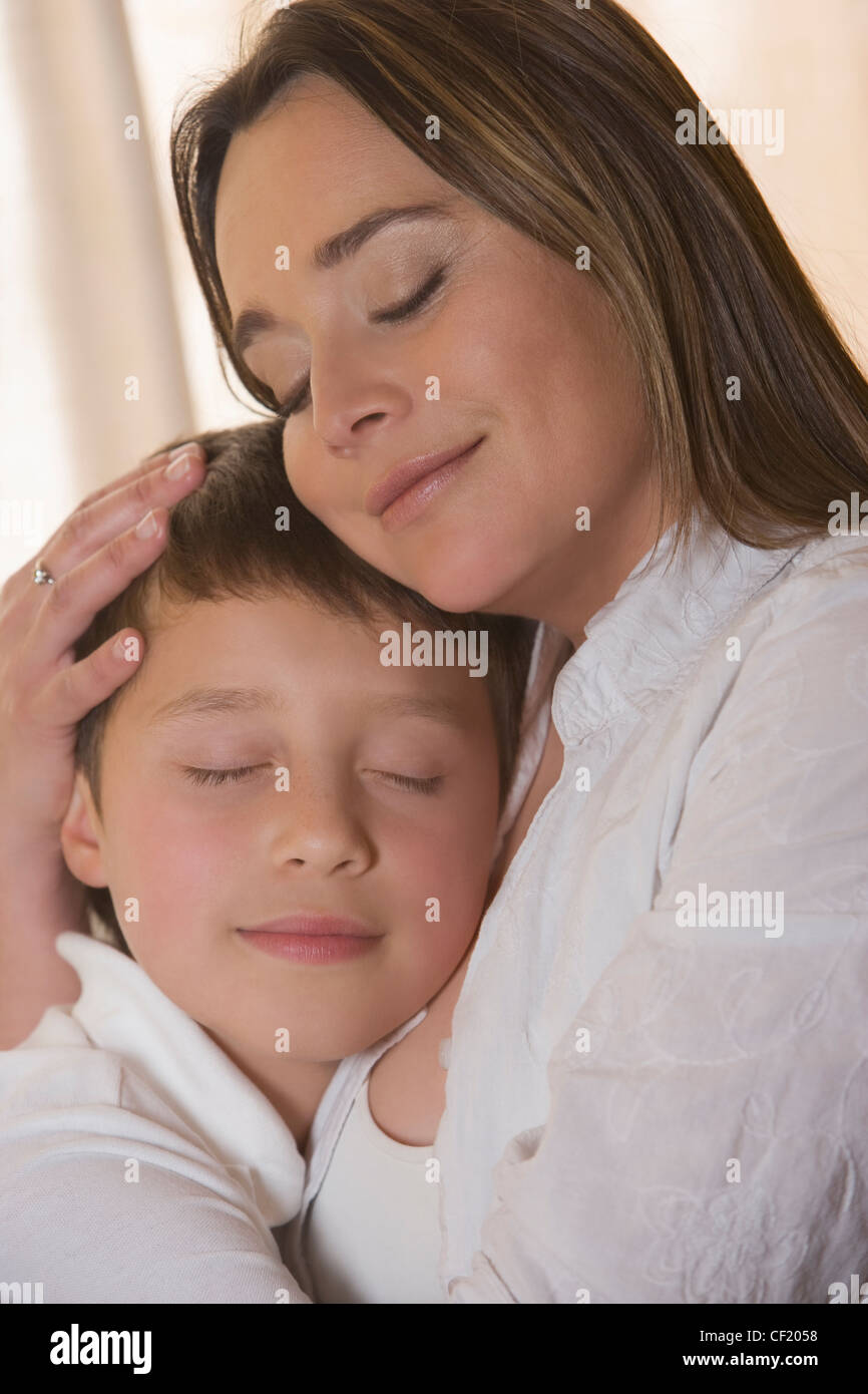 Mother and comforting son and 11 years hi-res stock photography and images - Alamy