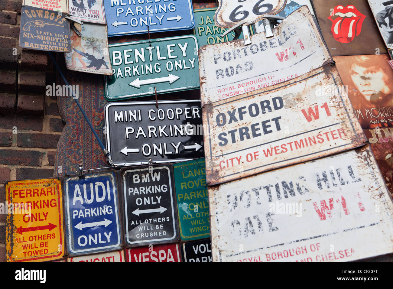 Iconic signs and plaques on display outside a shop in Portobello Road ...