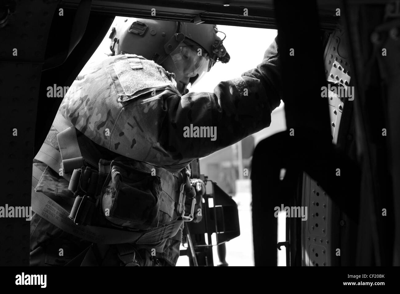 A UH-60 Black Hawk crew member assigned to A Company, 3-82 Aviation ...