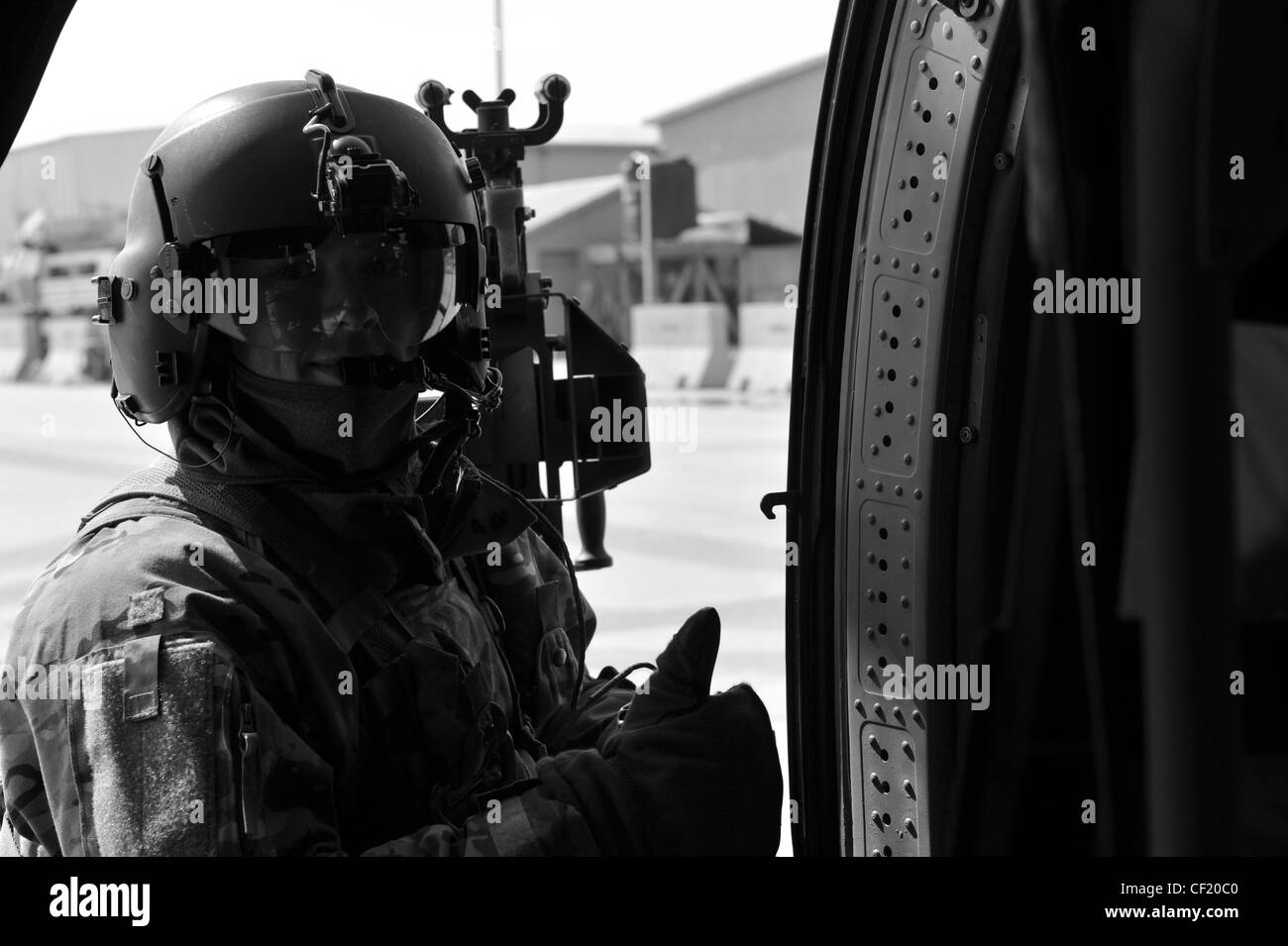 A UH-60 Black Hawk crew member assigned to A Company, 3-82 Aviation ...