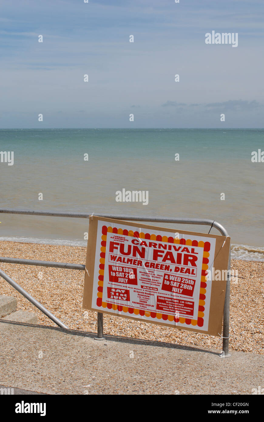 A notice advertising Deal fun fair on the promenade at Deal Stock Photo ...