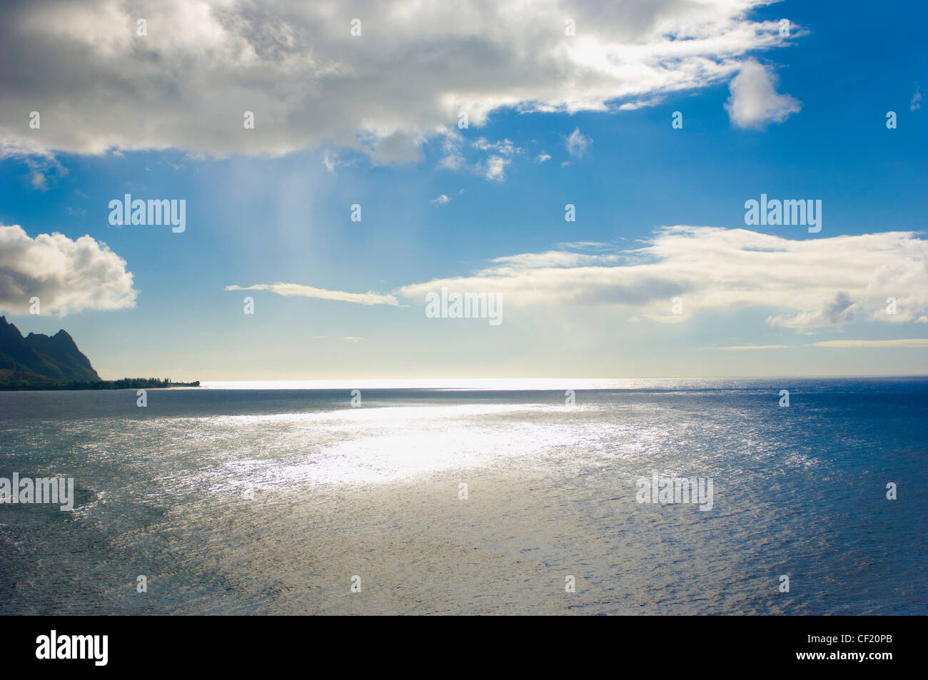 View Of Ocean And Clouds Above With The Sunlight Shining Through ...