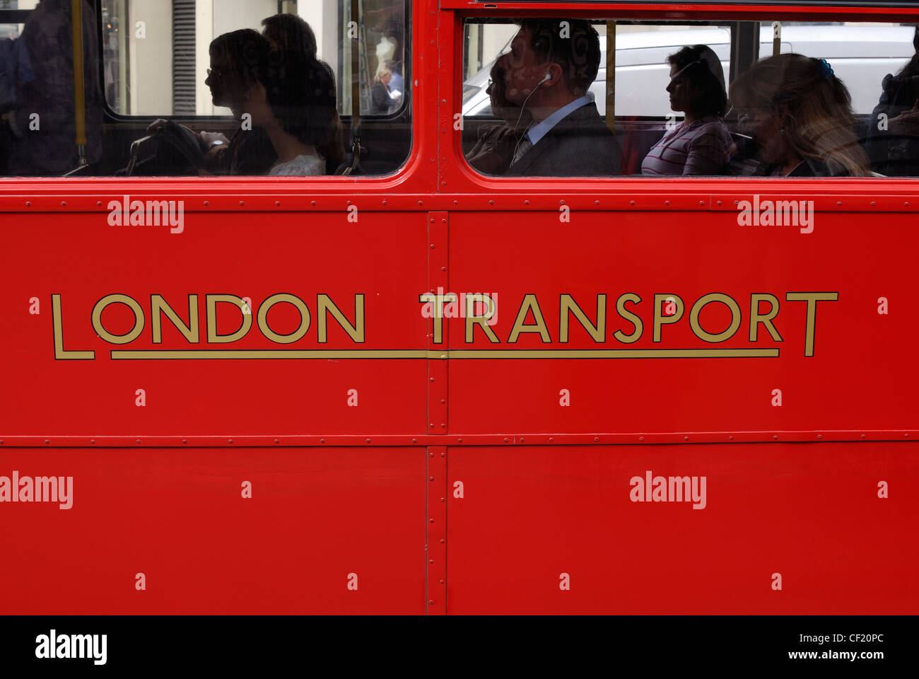 Passengers on the bottom deck of a Routemaster bus. Routemasters used ...