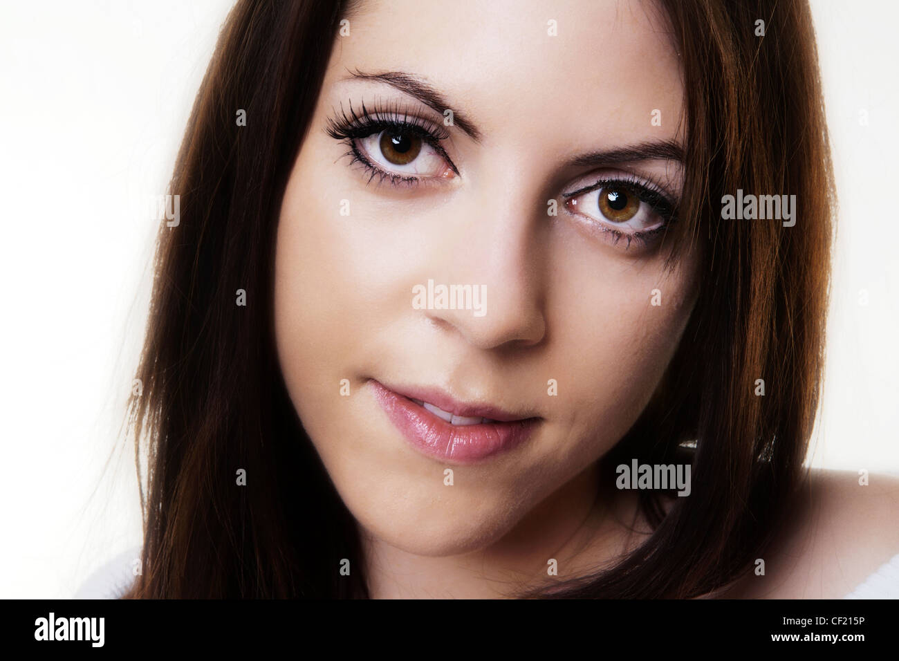 portrait of woman looking into camera close up Stock Photo - Alamy