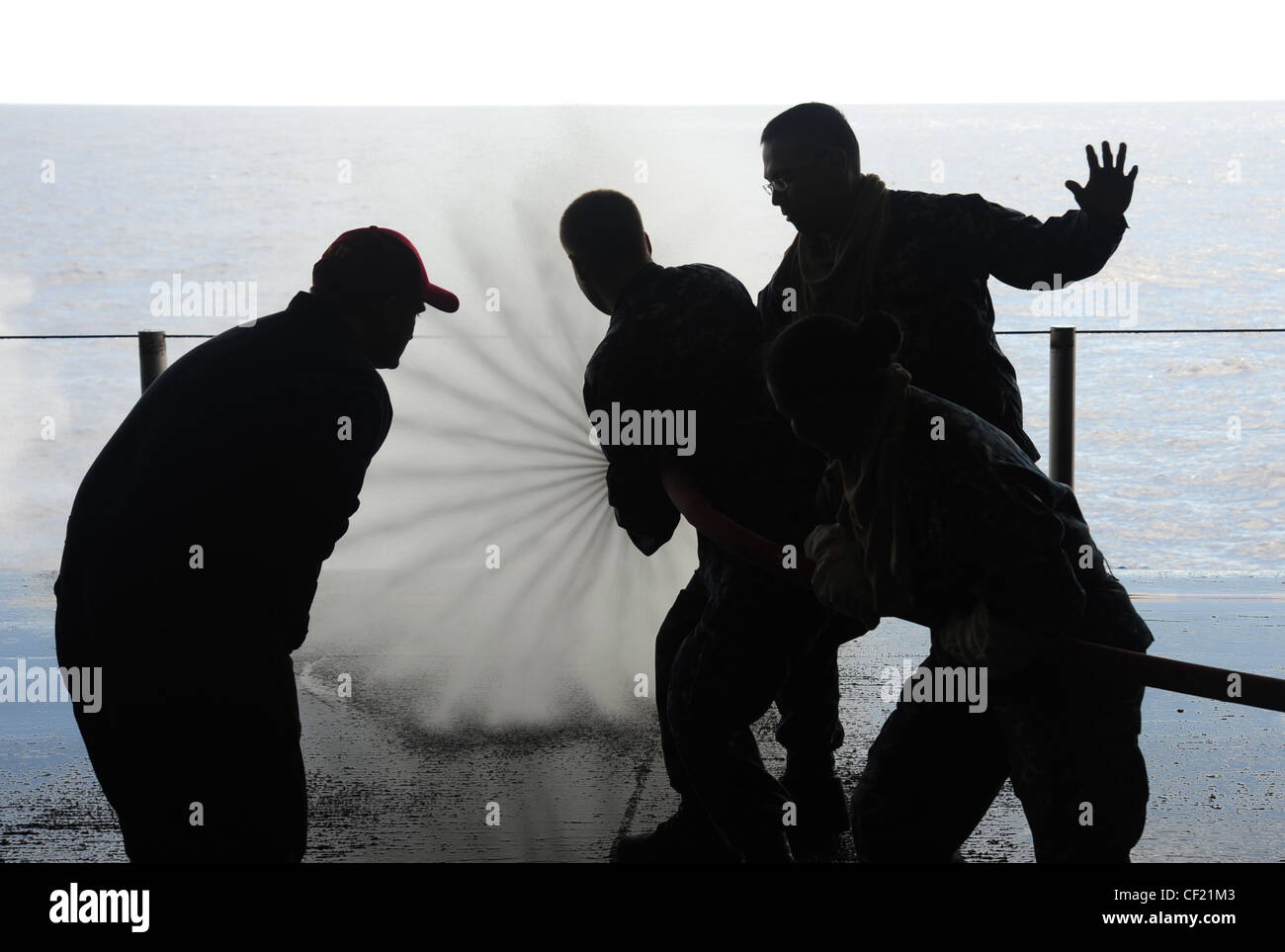U s navy sailor uss bonhomme richard damage control training hi-res ...
