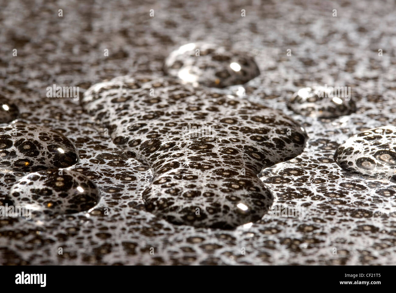 Water drops on metal surface - still life Stock Photo - Alamy