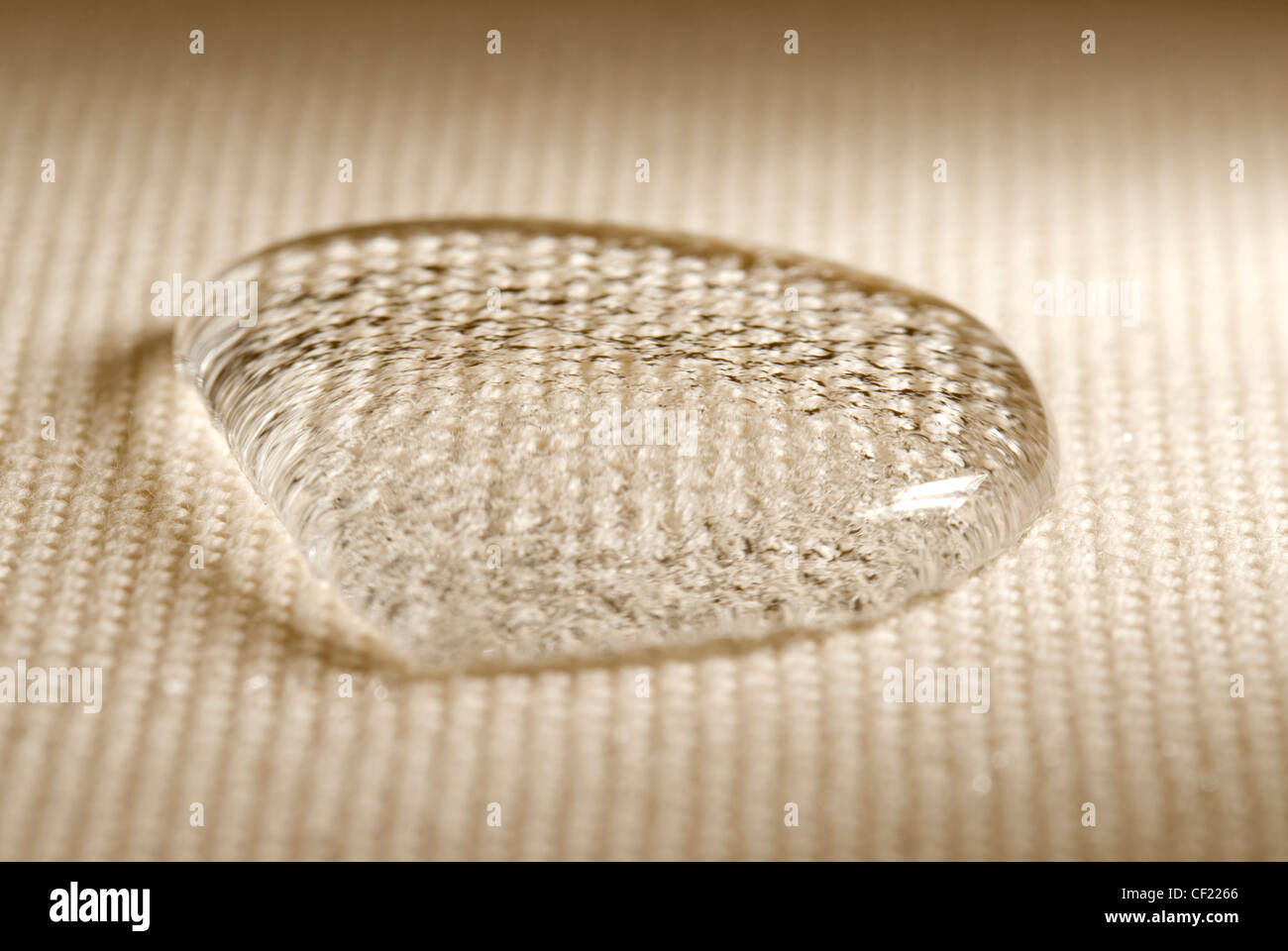 Water drops and fabric hi-res stock photography and images - Alamy