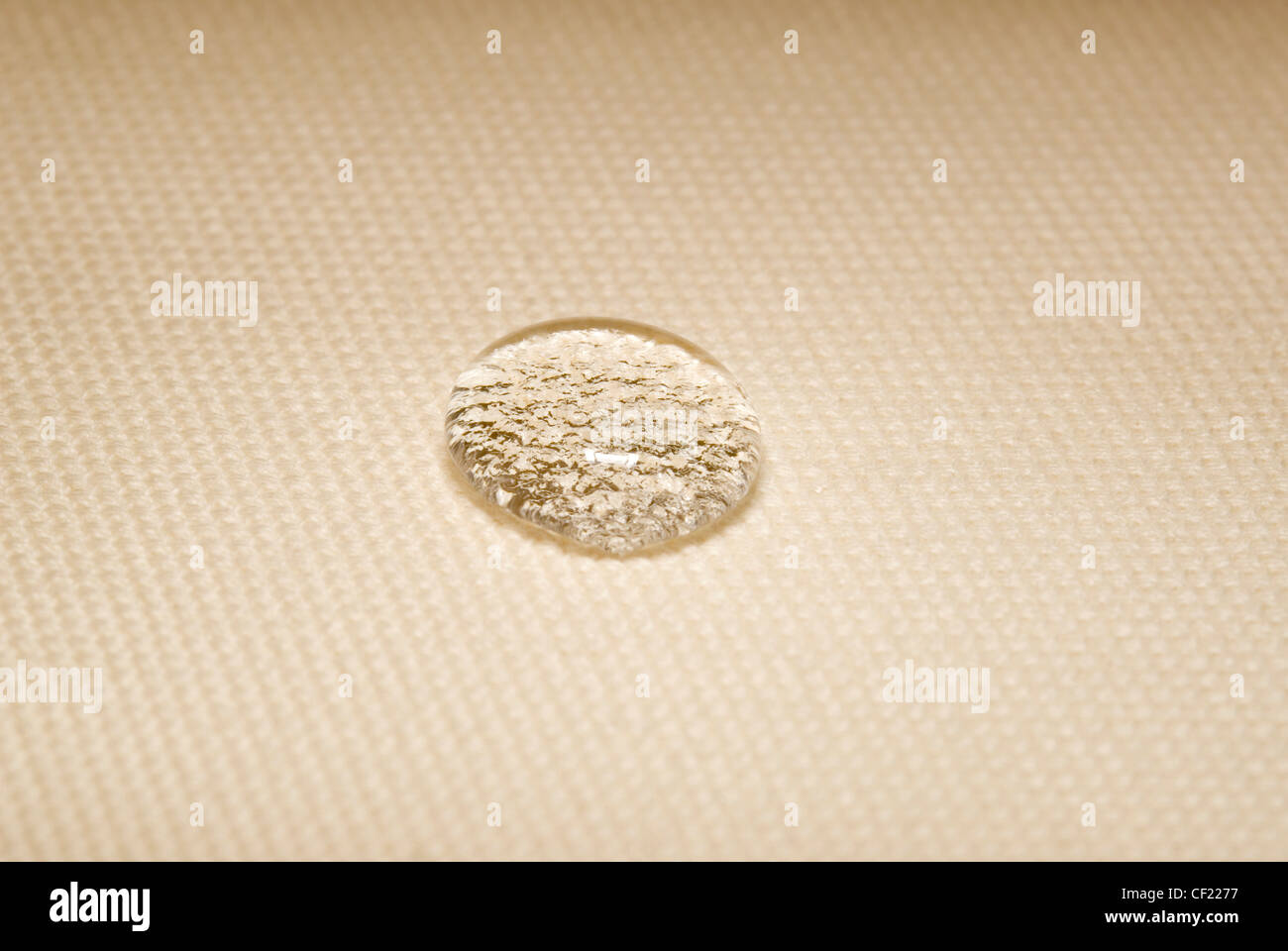 Water drops on canvas still life Stock Photo - Alamy