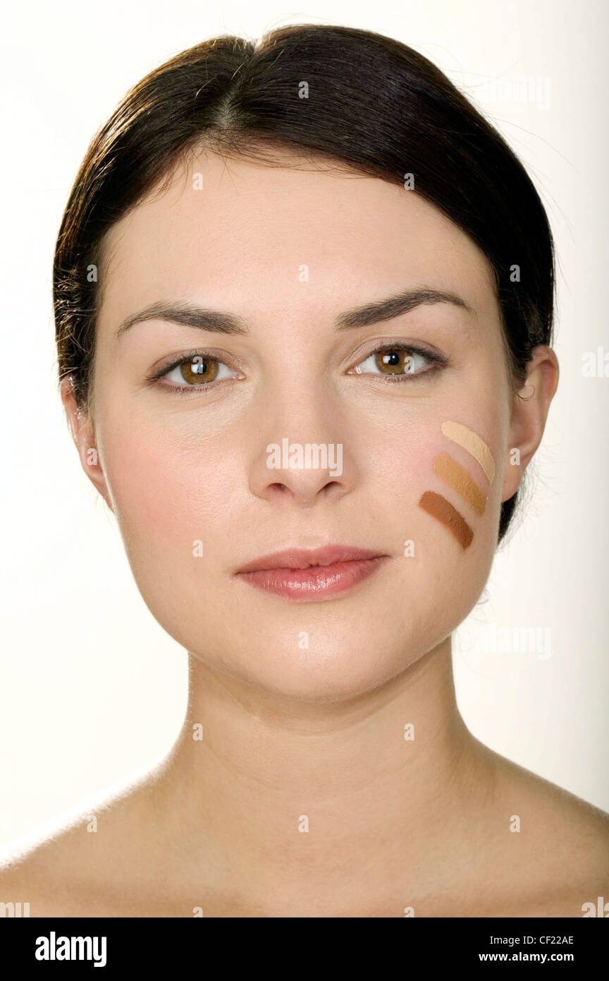 Female with brunette hair off face with three stripes of different ...