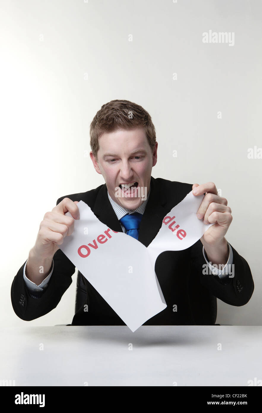 Man ripping up paper hi-res stock photography and images - Alamy