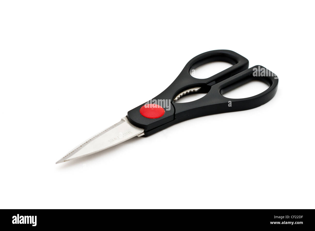 Pair of scissors isolated over white background Stock Photo - Alamy