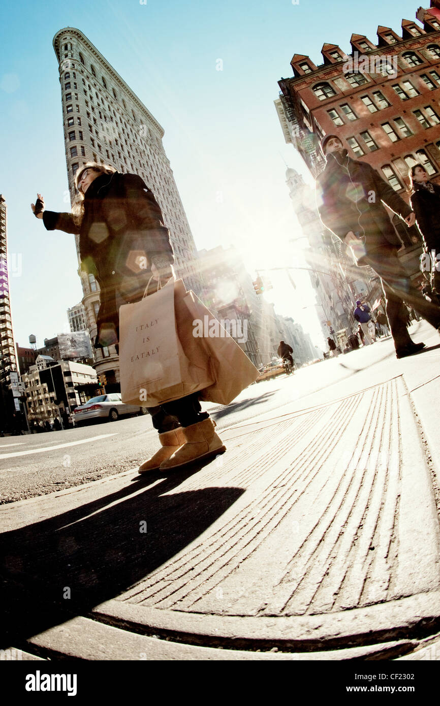 The Flatiron wedge shaped building in New York shooting into the sun ...