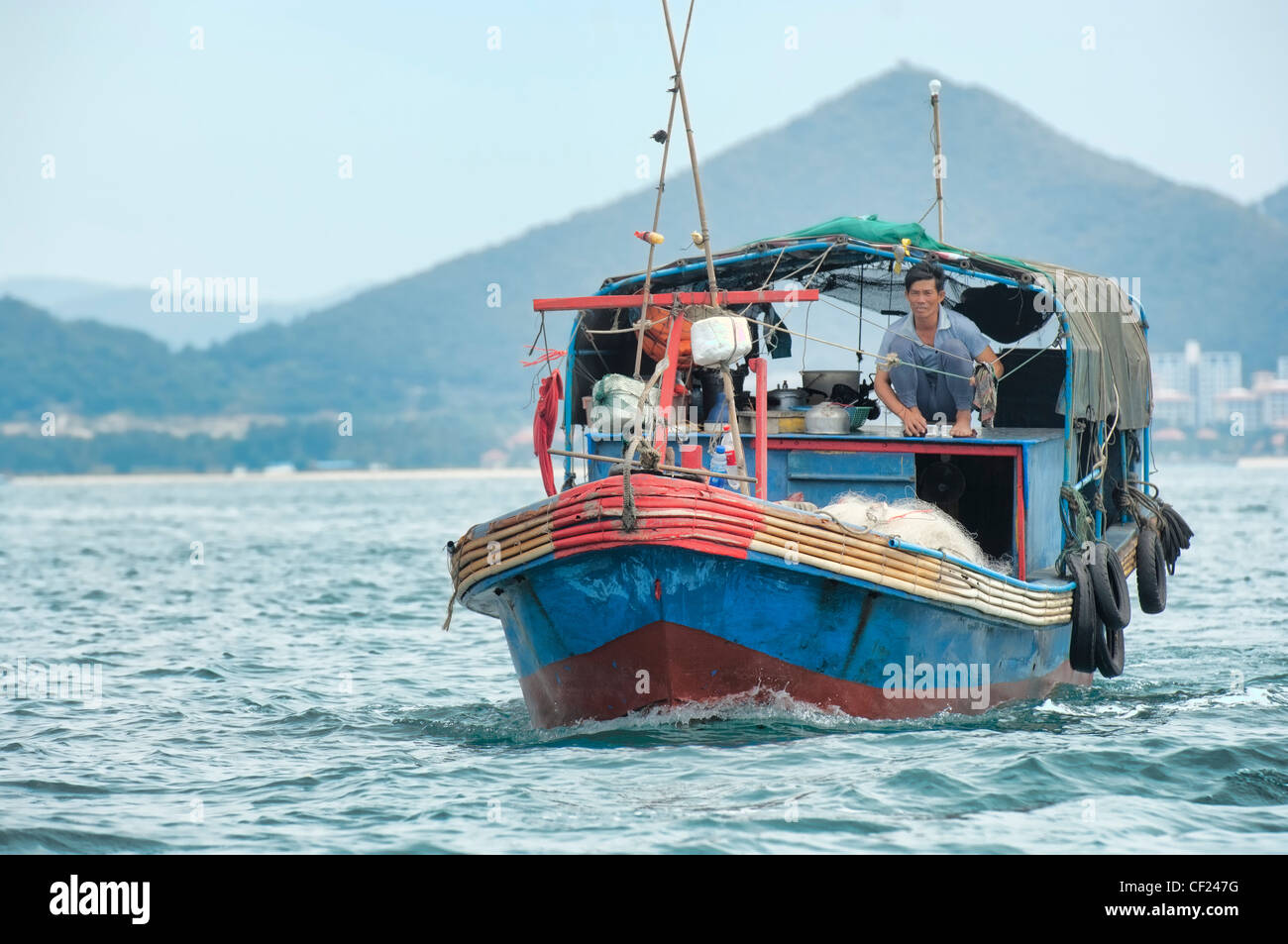 Small fishing boat, Sanya, Hainan province, China Stock Photo - Alamy