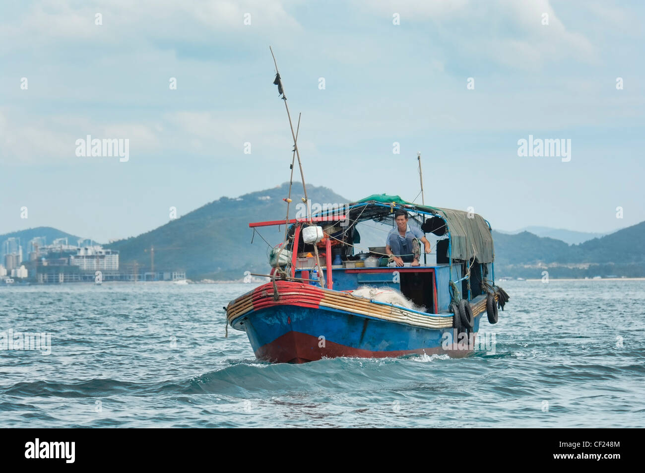 Small fishing boat, Sanya, Hainan province, China Stock Photo - Alamy