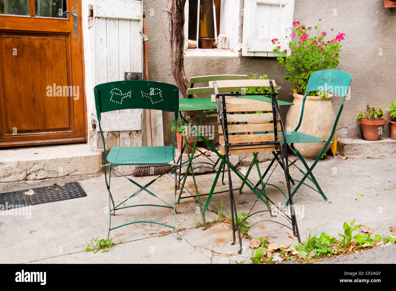 French terrace with green typical furniture Stock Photo - Alamy