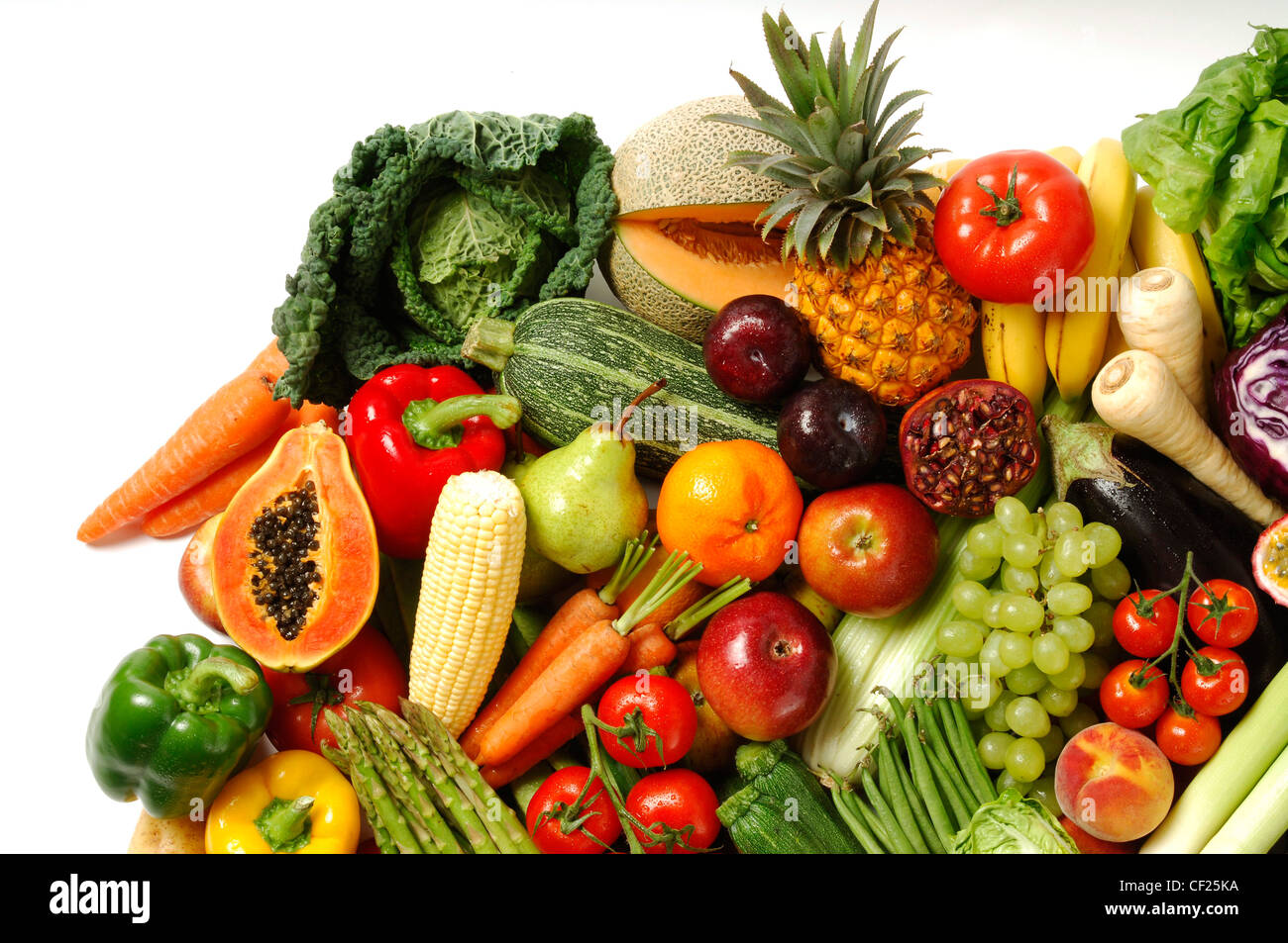 Selection of fruit and vegetables including oranges, leeks, passion ...