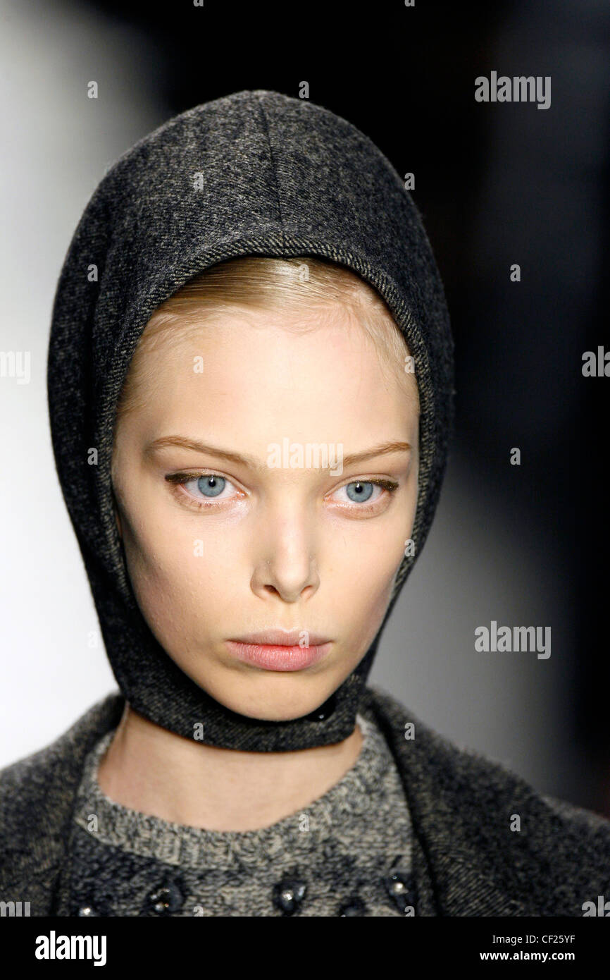 Head shot of Russian model Polina Kouklina wearing a wool grey hood ...