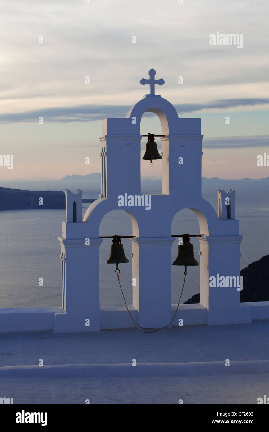 A traditional greek bell tower with the sea beyond Stock Photo - Alamy