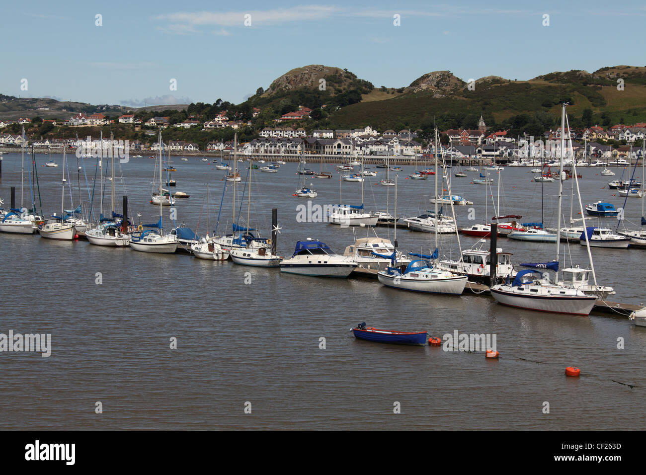 Town of Conwy, Wales. Leisure and fishing boats moored in Conwy Harbour ...