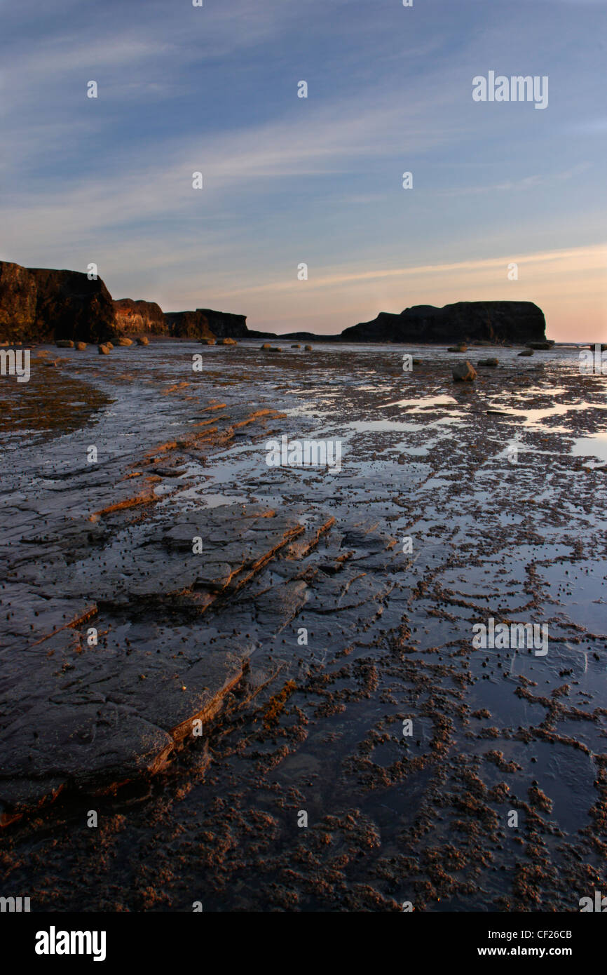 Morning light iluminates the coastline of Saltwick Bay and Nab near ...