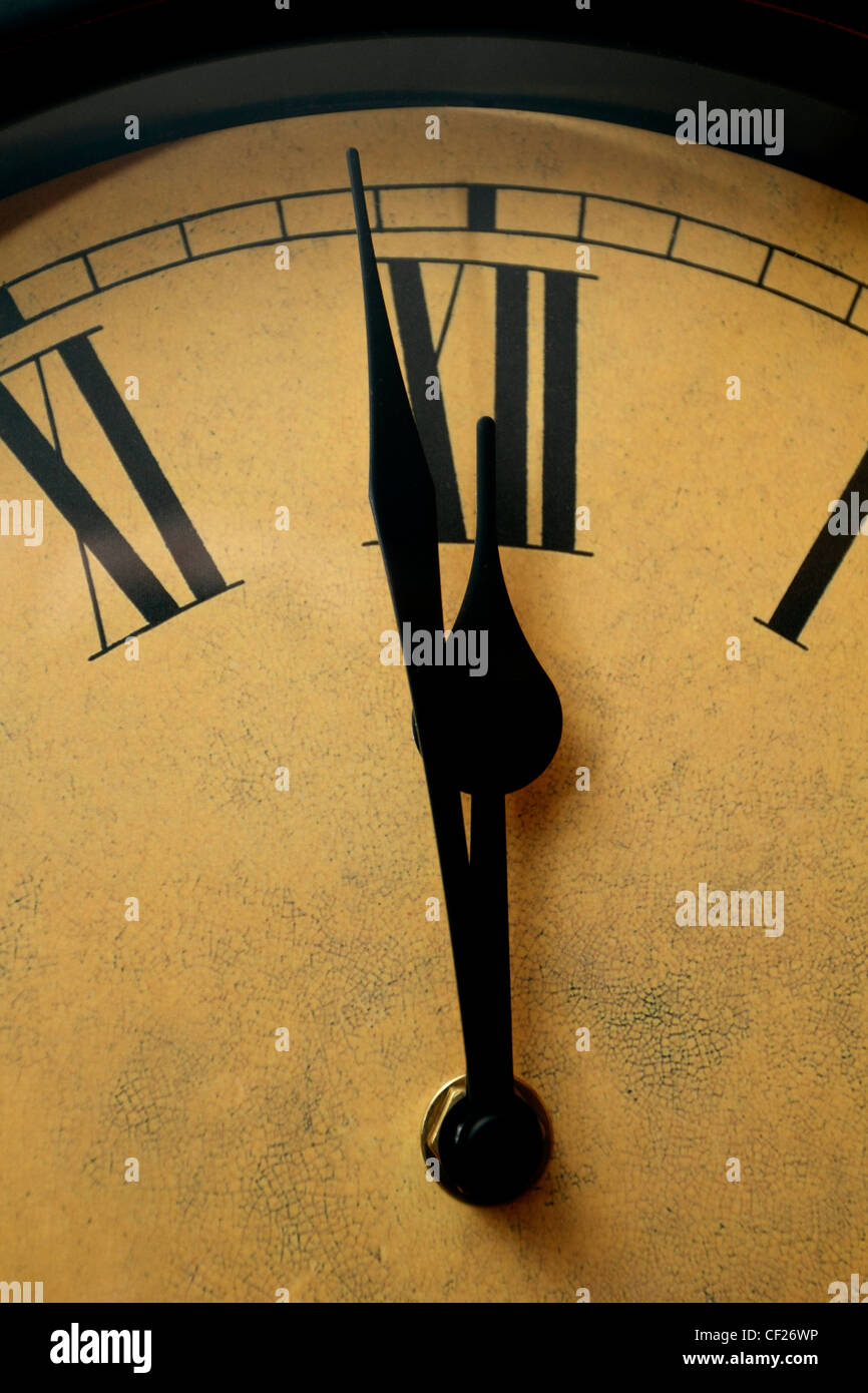 Clock about to strike Midnight Stock Photo - Alamy