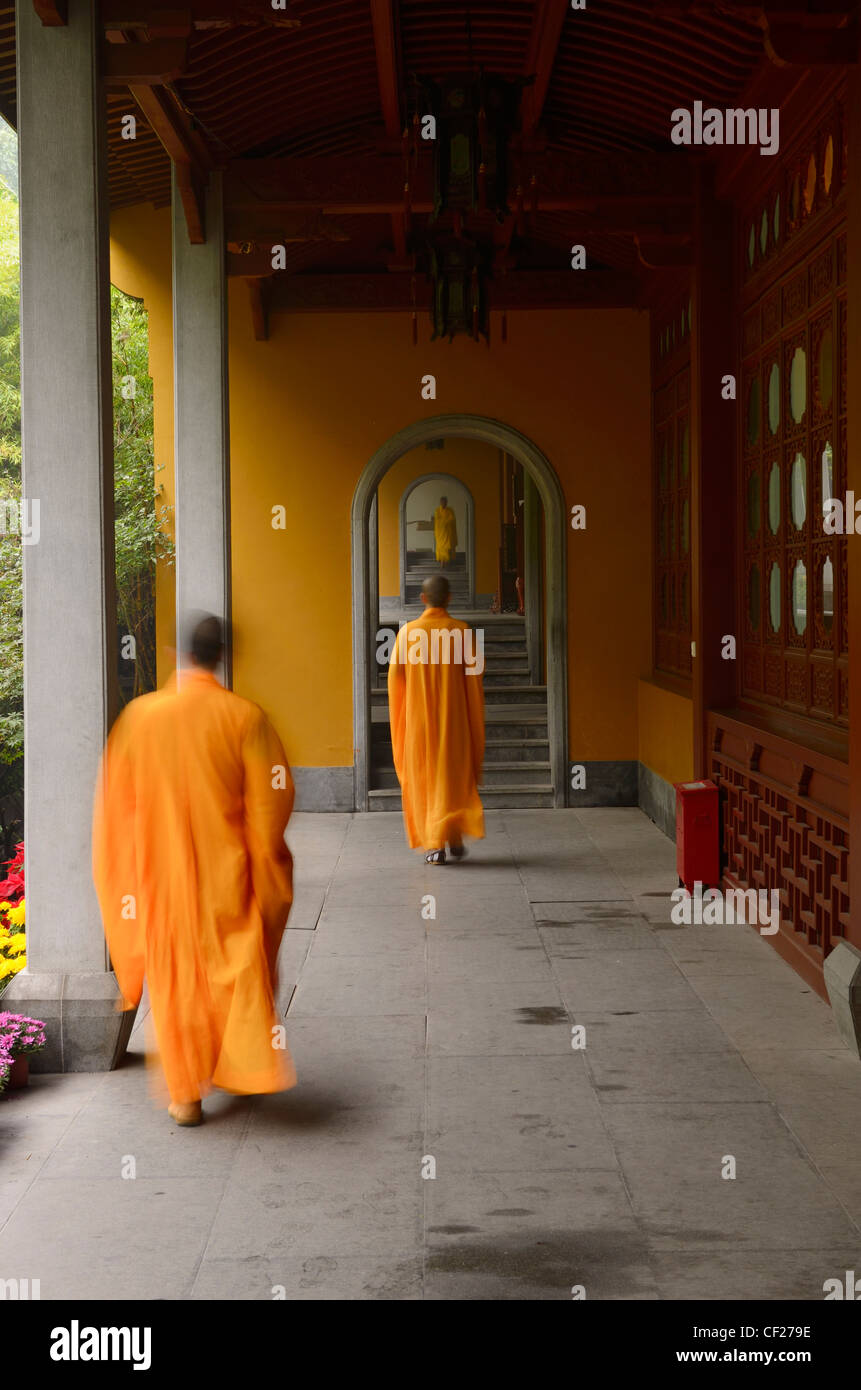 Buddhist monks called to the dining hall at the Ling Yin Temple in ...