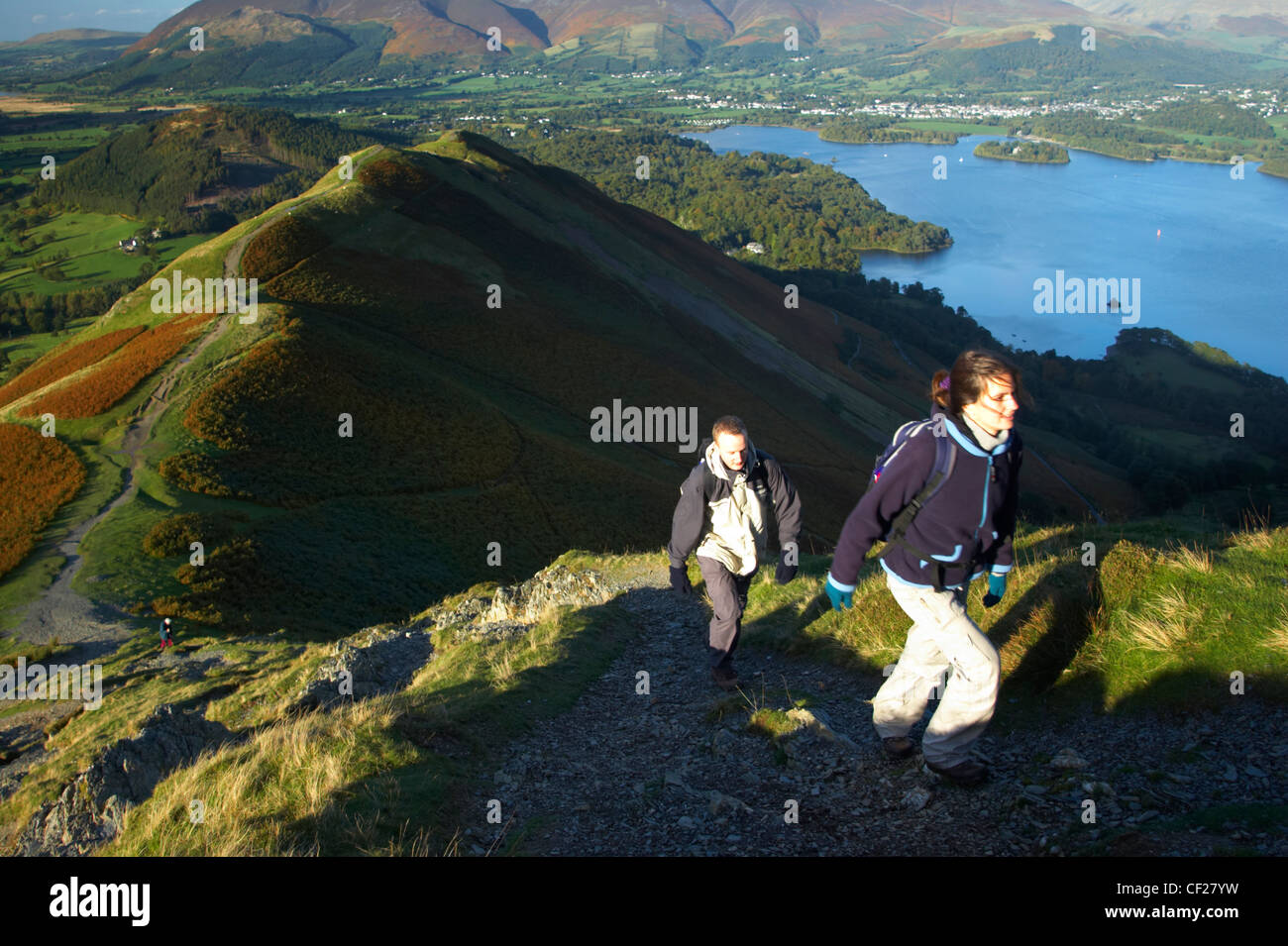 Hikers walking up Cats Bells near Derwentwater Stock Photo - Alamy