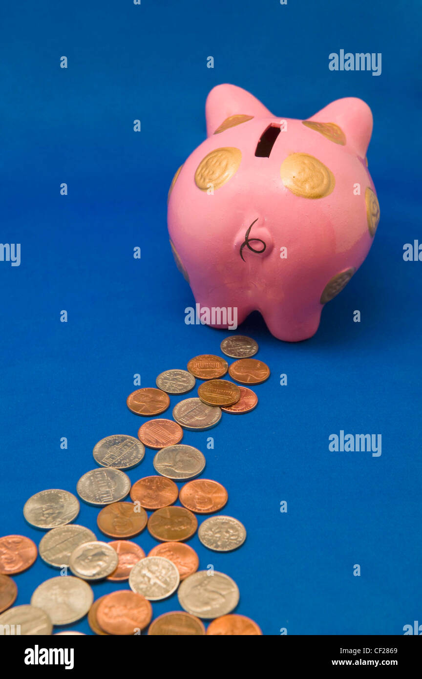 Piggy Bank's Financial Waste Stock Photo - Alamy