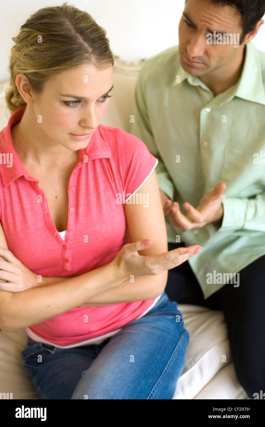 Couple arguing, Female with back to male Stock Photo - Alamy