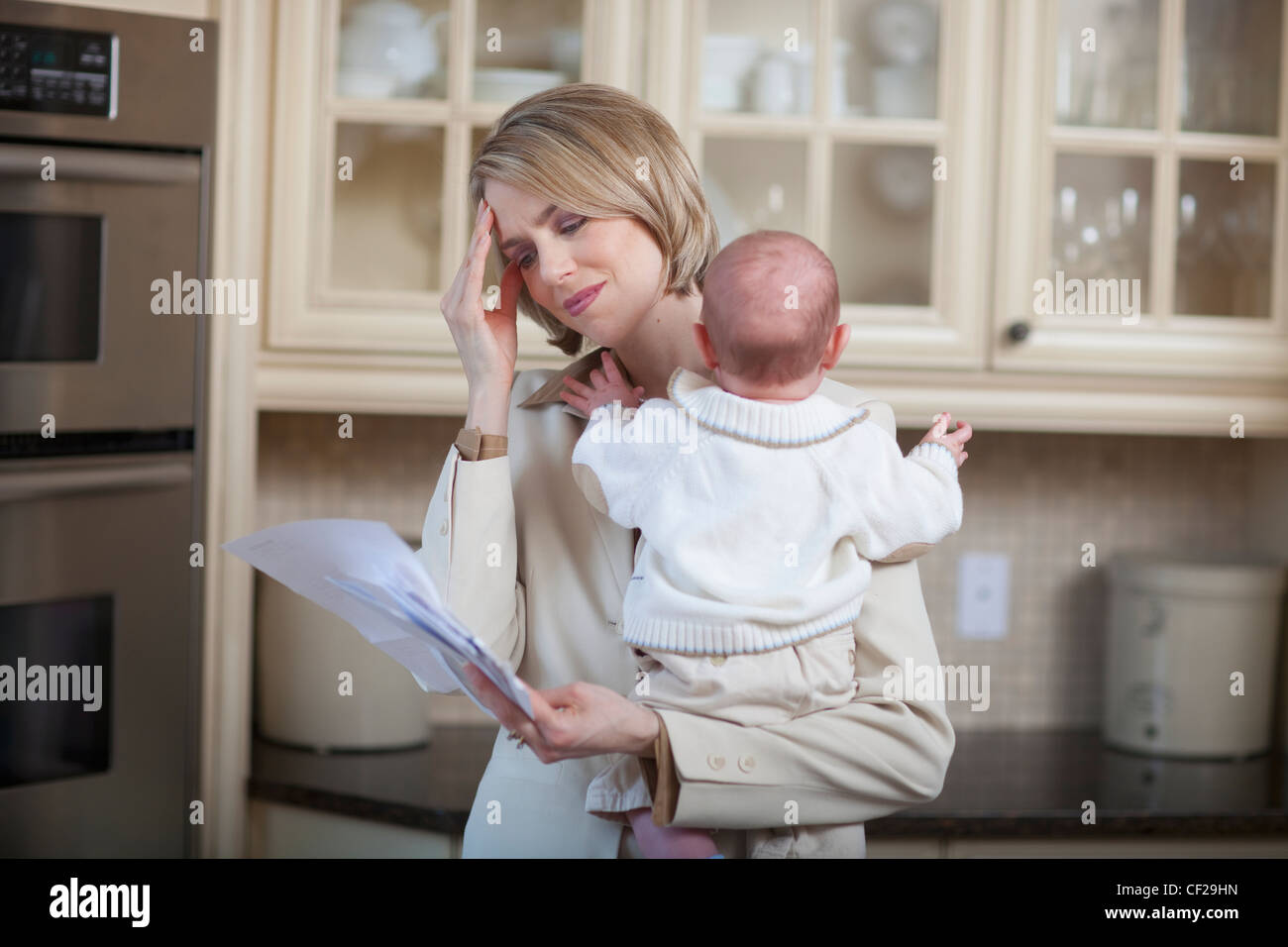 Mother With Baby Stressing Over Household Bills; Jordan Ontario Canada ...