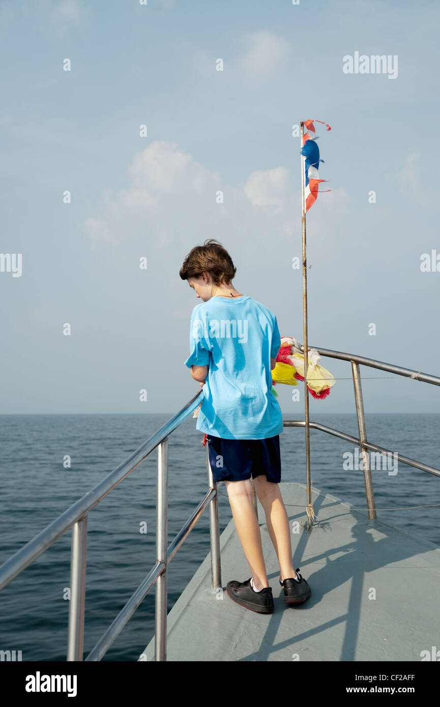 Boy On Boat With Flag Of Thailand; Phi Phi Island Thailand Stock Photo ...