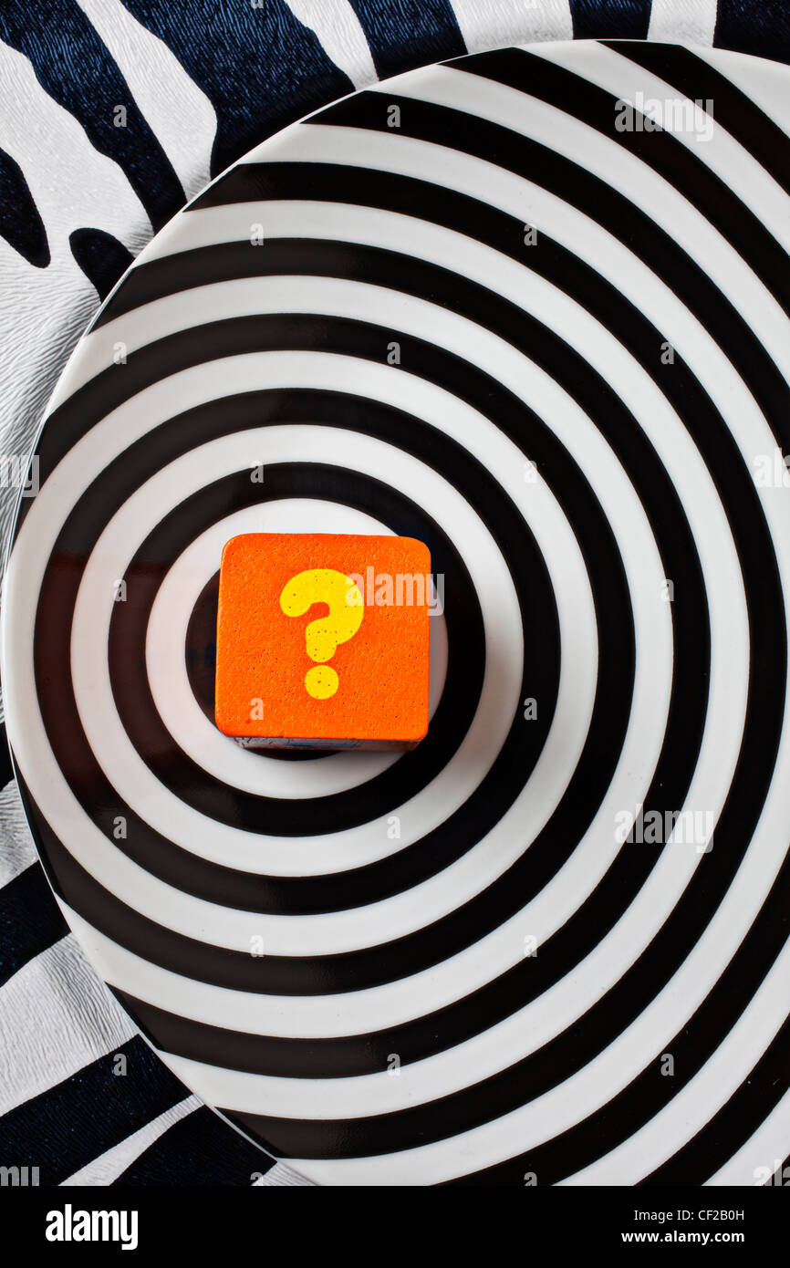 Question mark on circle plate Stock Photo - Alamy