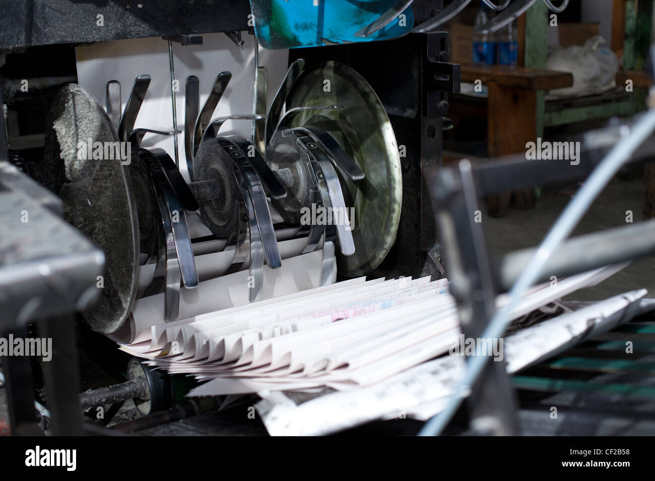 ready newspaper throw from production line in a print shop Stock Photo ...