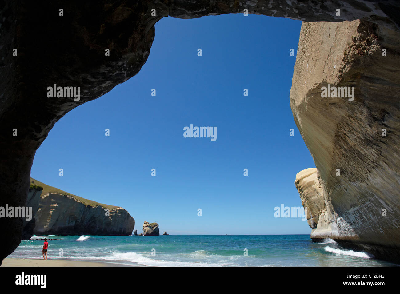 Looking out from sea cave, Tunnel Beach, Dunedin, South Island, New ...