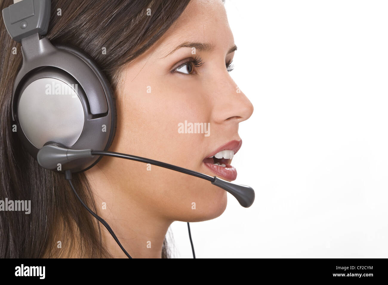 Profile of a young woman with a headset Stock Photo - Alamy