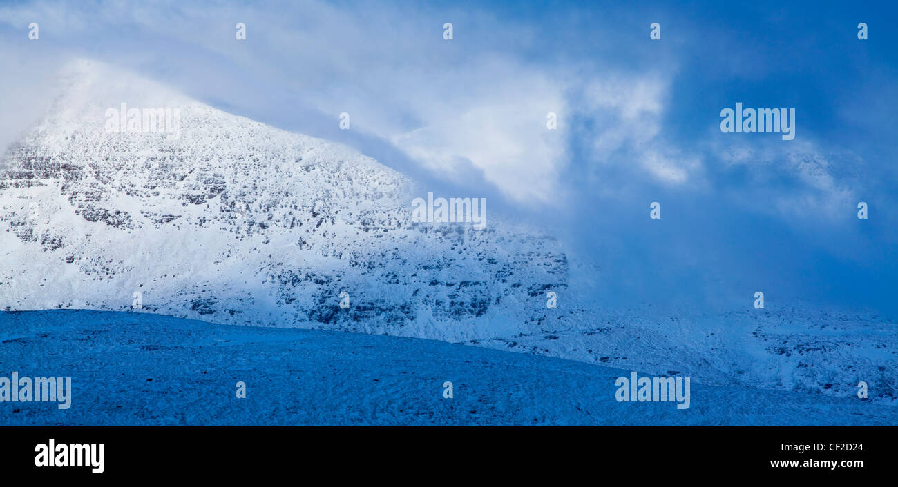 Storm clouds engulf the peaks of the Assynt region Stock Photo - Alamy