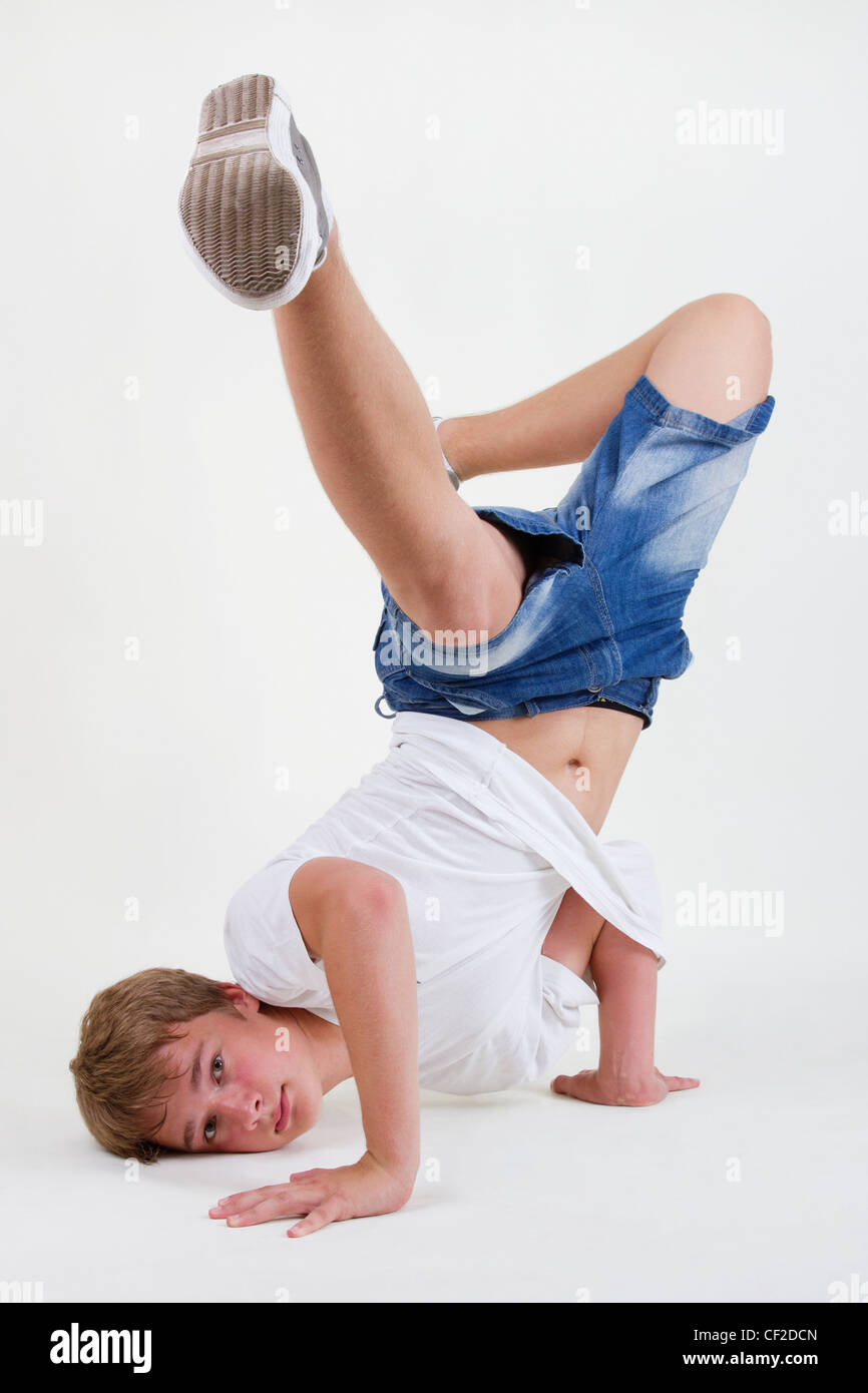 Teenager bboy training on white background Stock Photo - Alamy