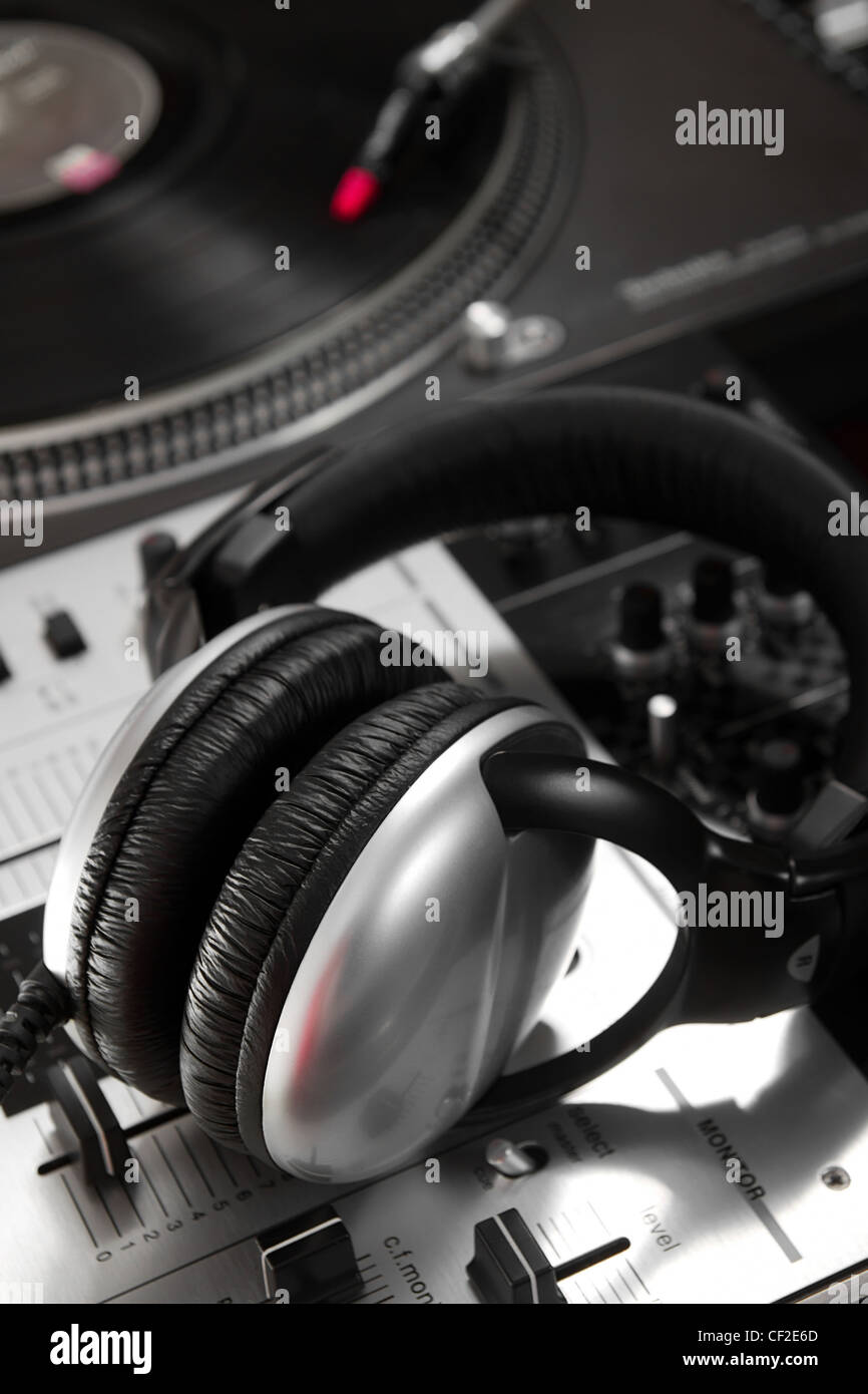 Big stereo headset for a DJ on sound mixer and part ov turntable ...