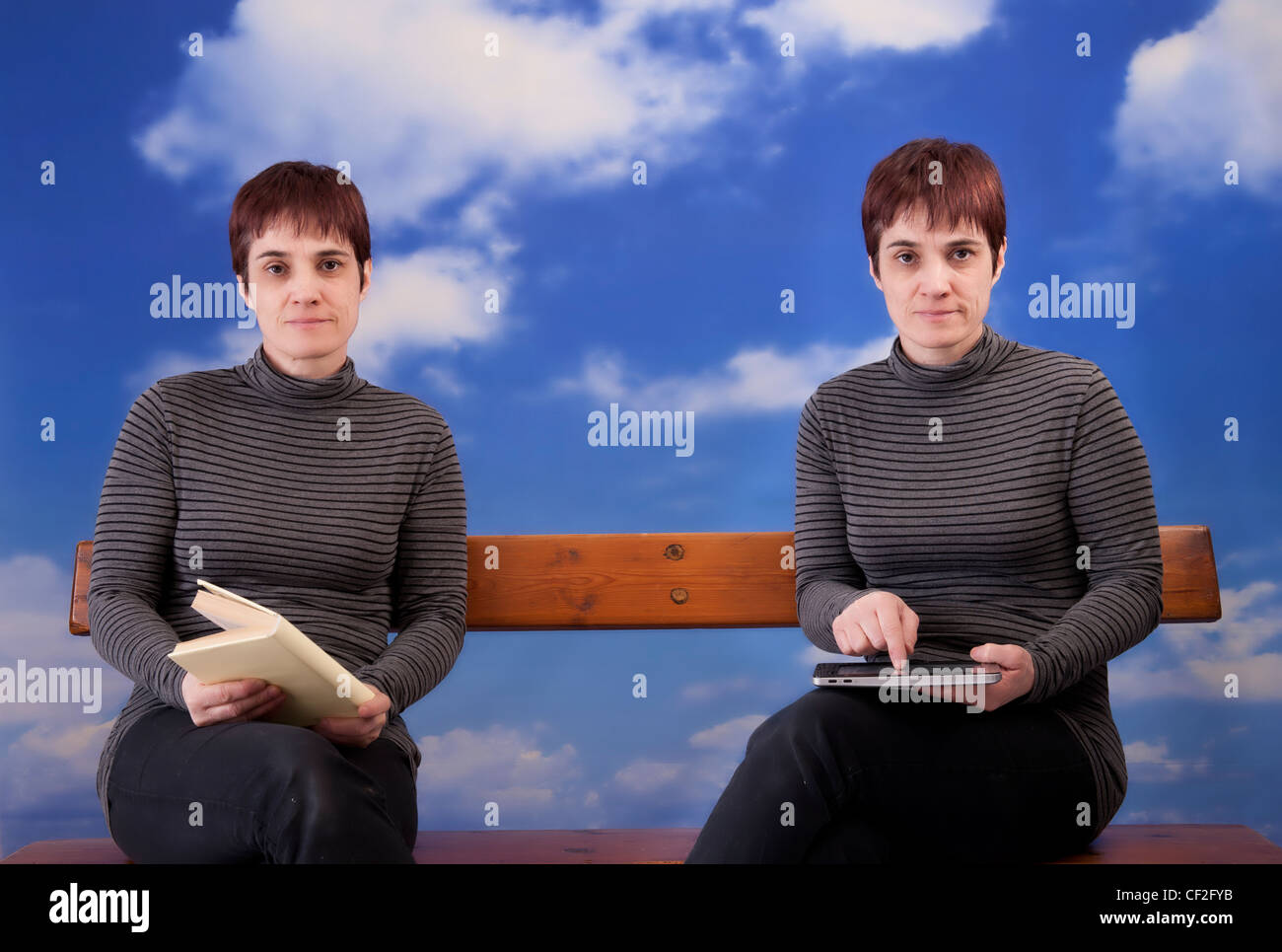 mature woman reading a book, sitting on a bench Stock Photo - Alamy