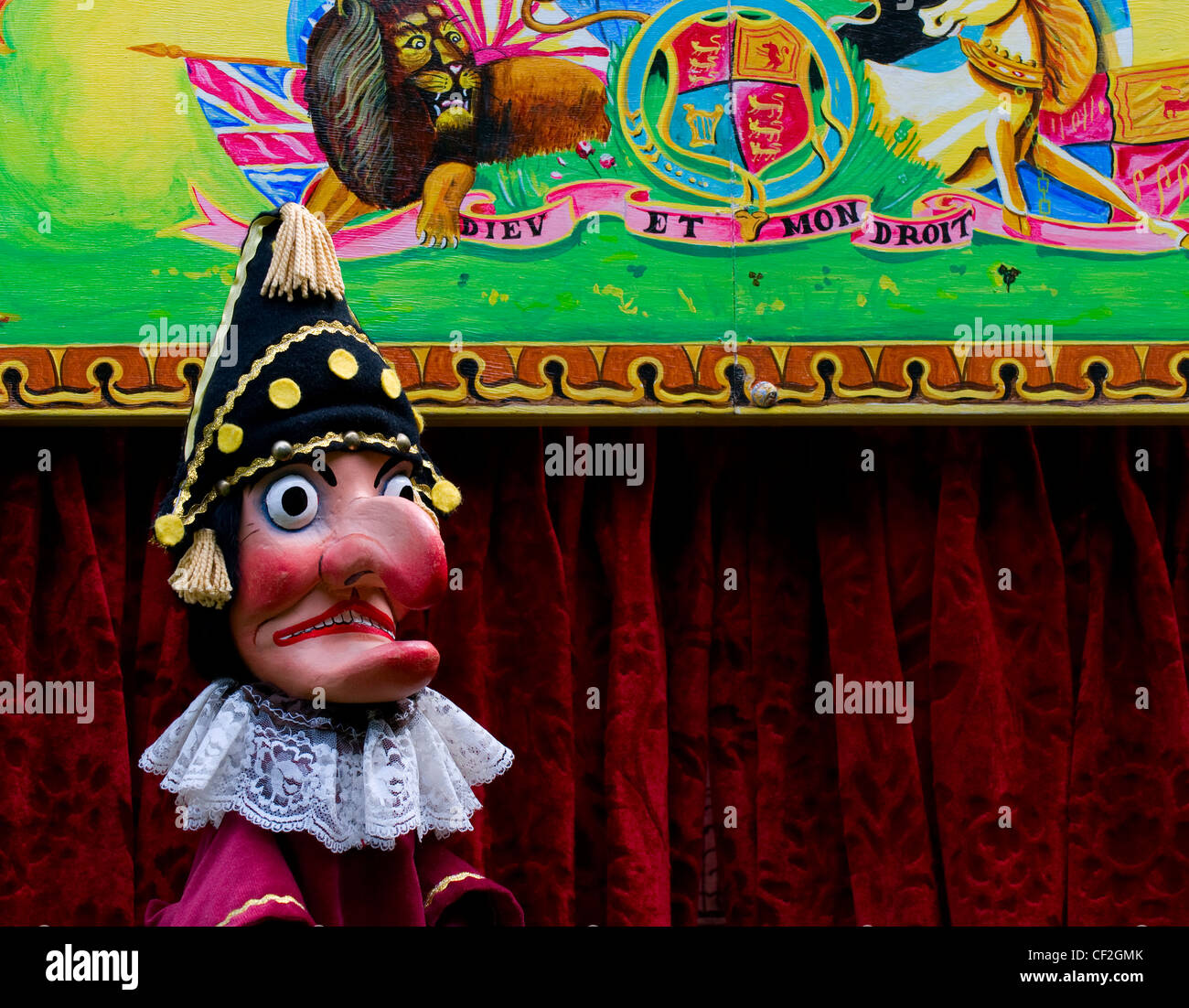 Mr Punch puppet in a booth during a performance at the annual Punch and ...