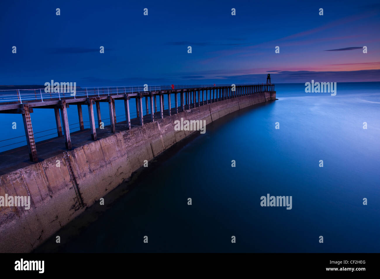 One of the entrance piers of Whitby Harbour at dawn Stock Photo - Alamy