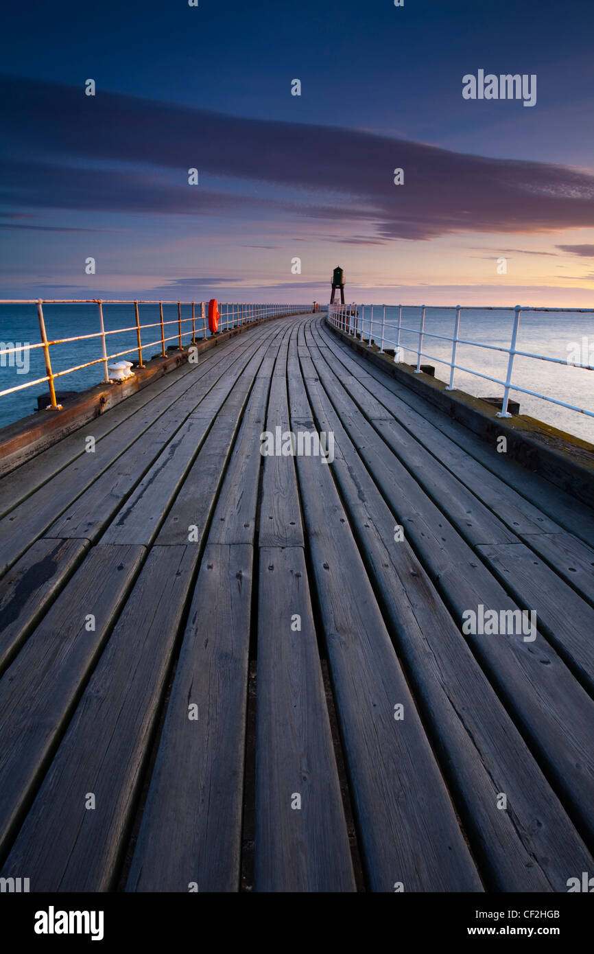 One of the entrance piers of Whitby Harbour at dawn Stock Photo - Alamy