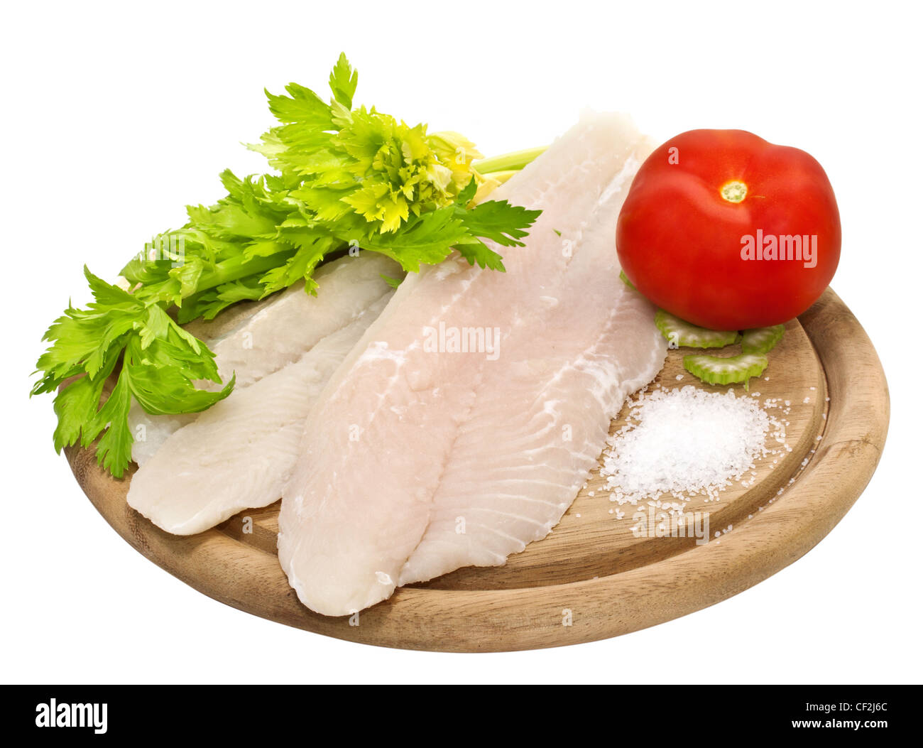 Fresh fish fillets with spices and celery Stock Photo - Alamy
