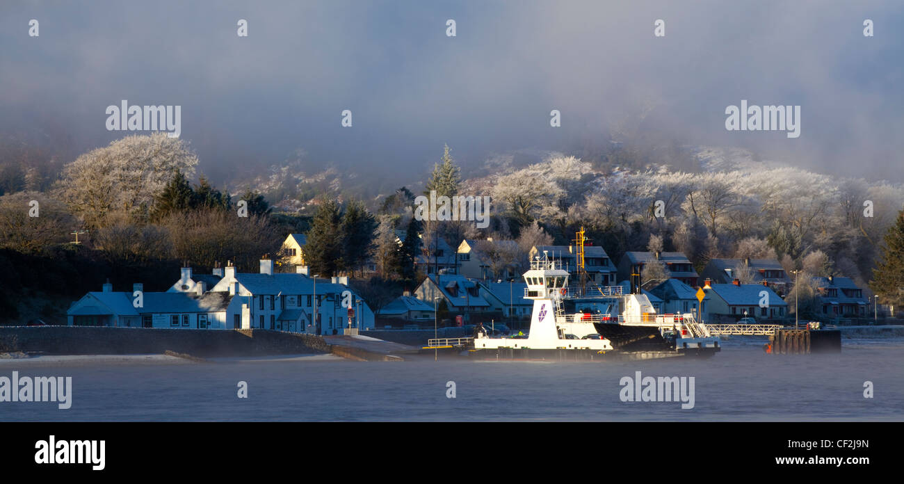 The Corran ferry port with hoarfrost covered woodland behind Stock ...
