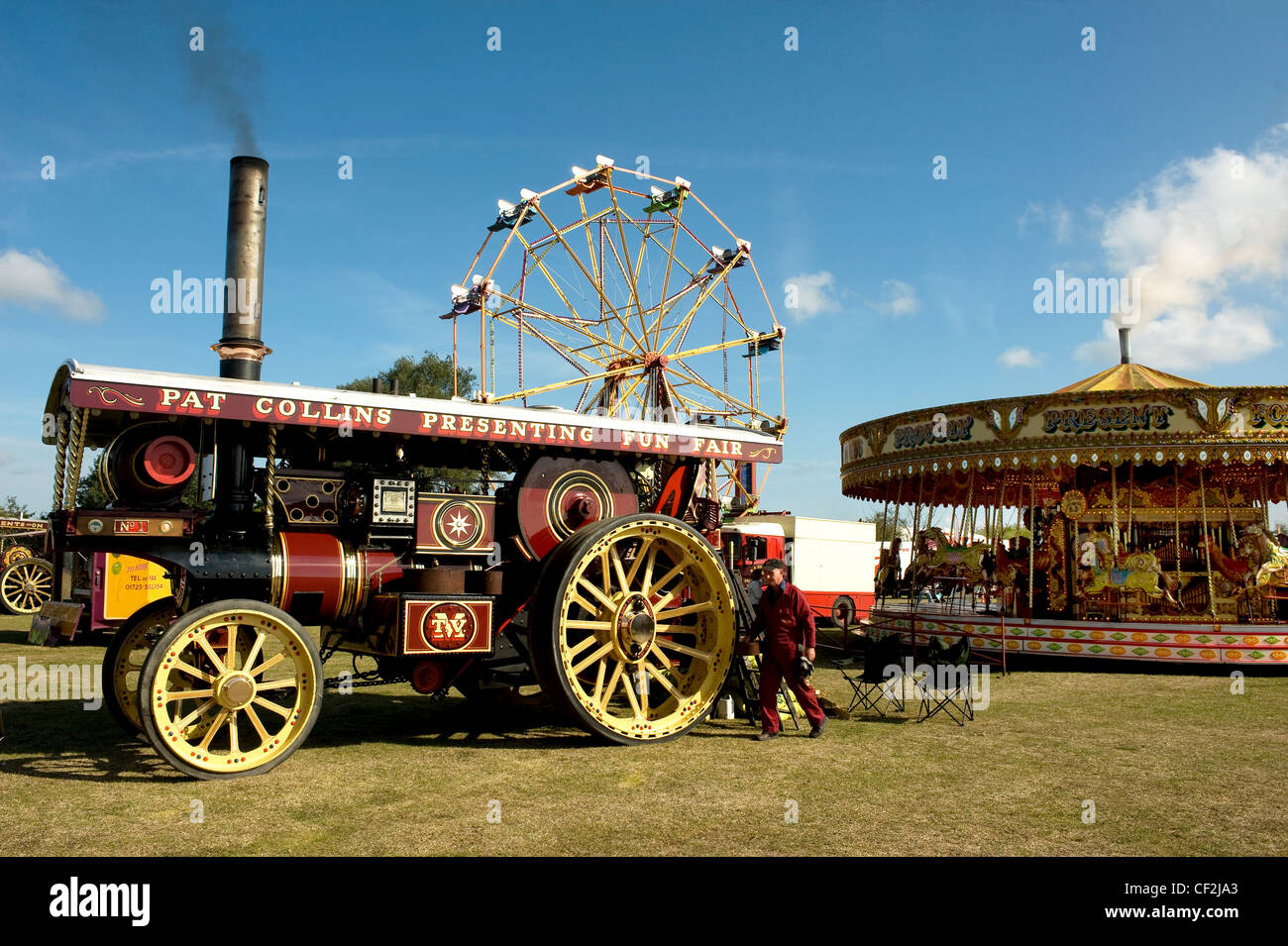 A steam traction engine and a traditional funfair at the Essex Country ...
